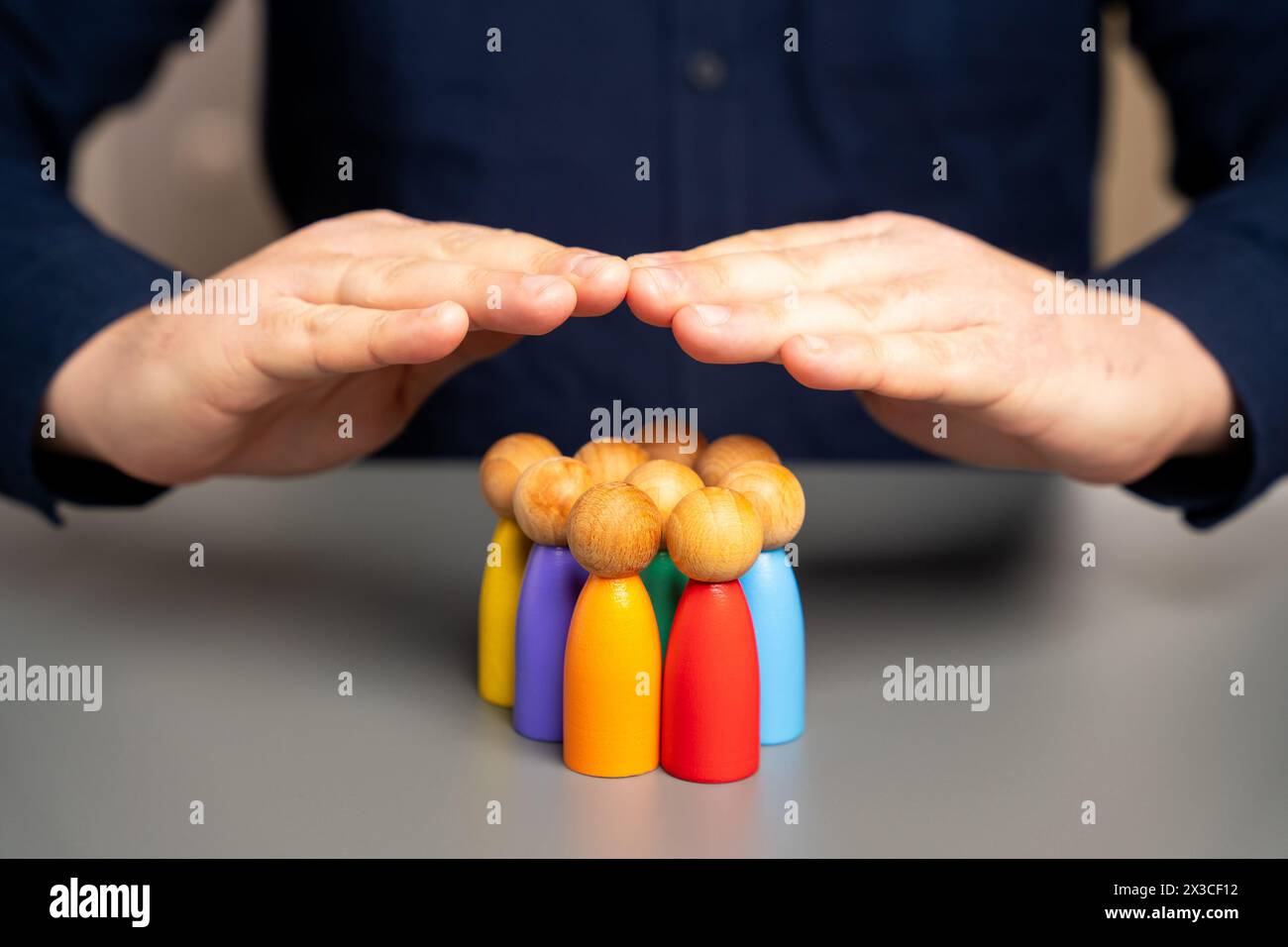 Boss defending his team with a gesture of protection.Security and ...