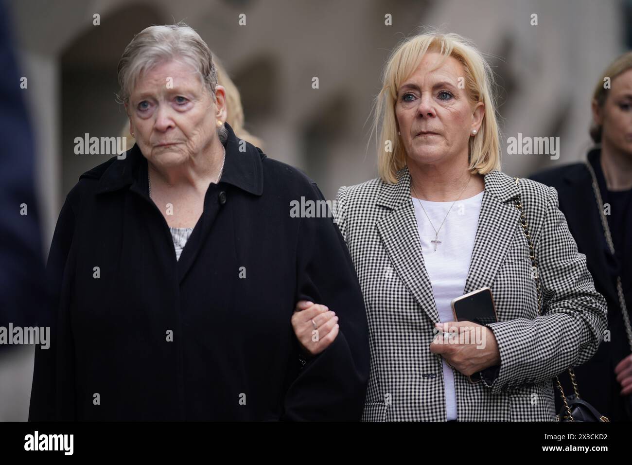 Charlene Ritchie (left), the mother of one of the victims, alongside ...
