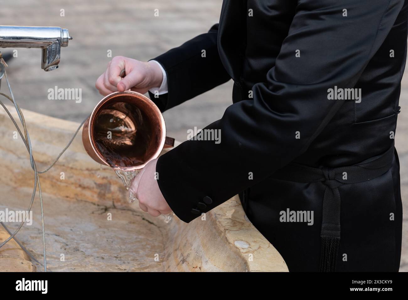 Ritual hand washing hi-res stock photography and images - Alamy