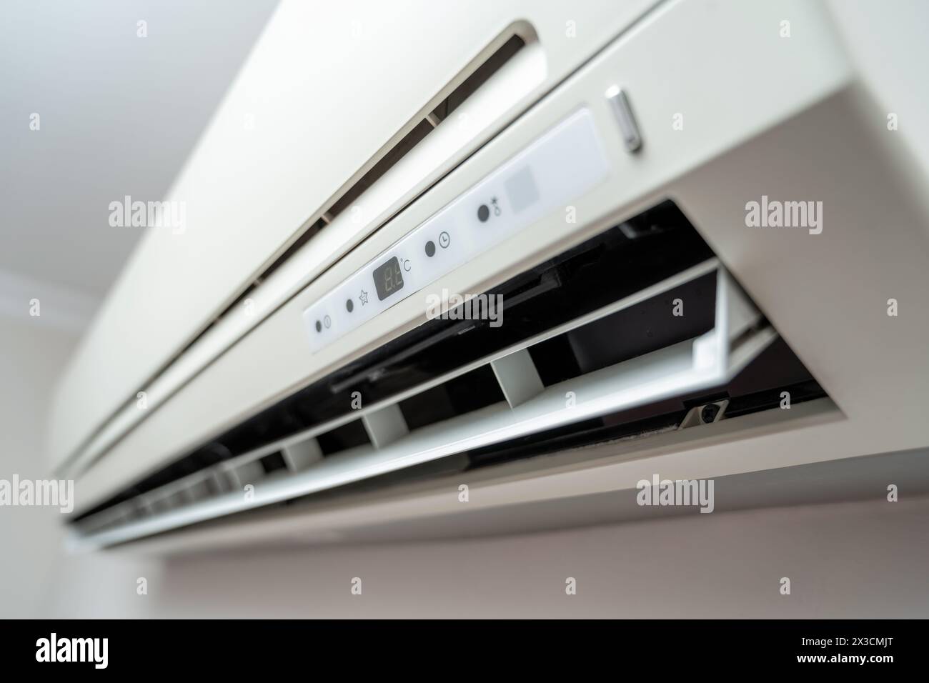 empty wall mounted white color inverter air conditioner Stock Photo - Alamy
