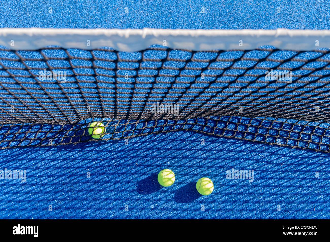 Three tennis balls racket hi-res stock photography and images - Alamy