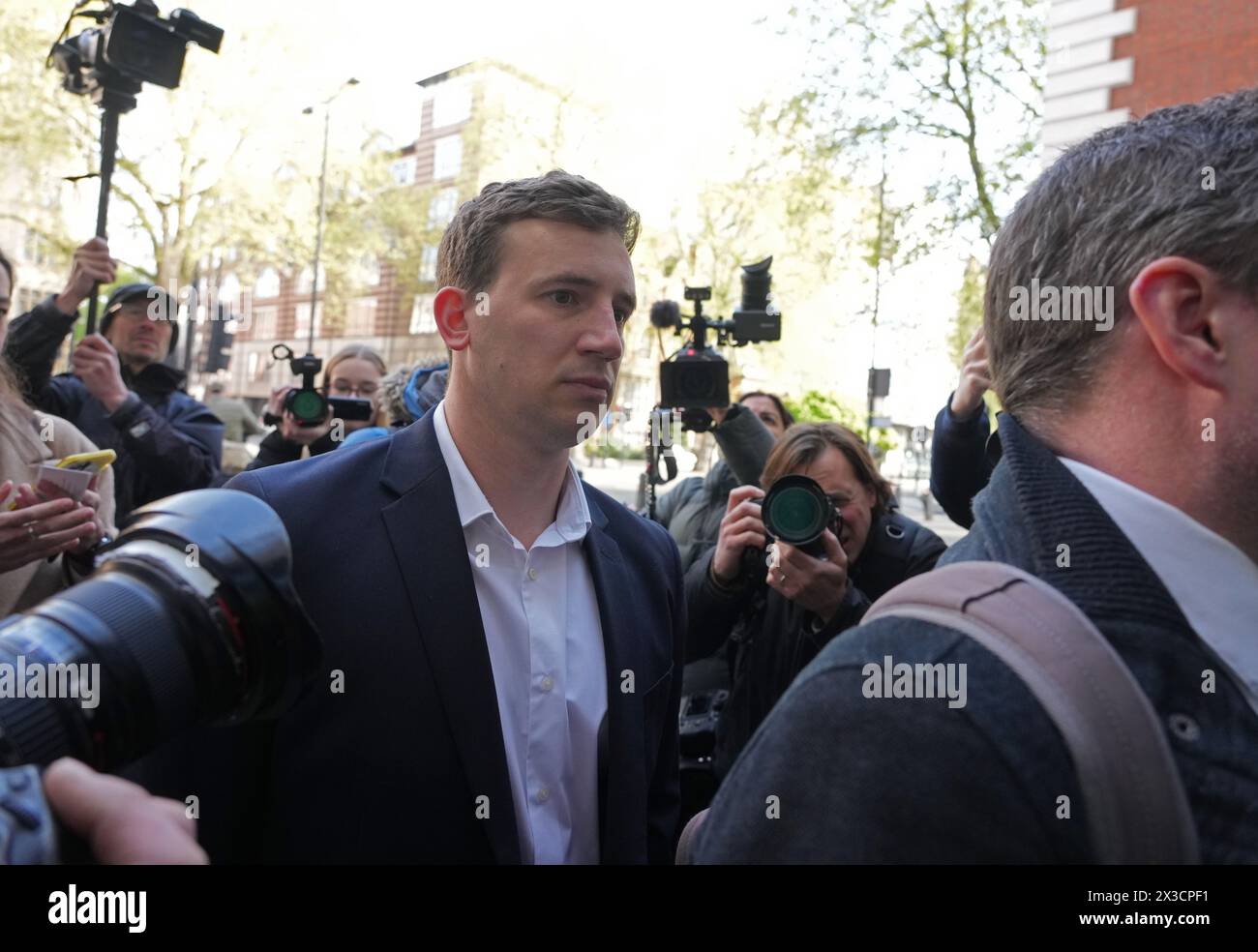 Former parliamentary researcher Christopher Cash arrives at Westminster ...
