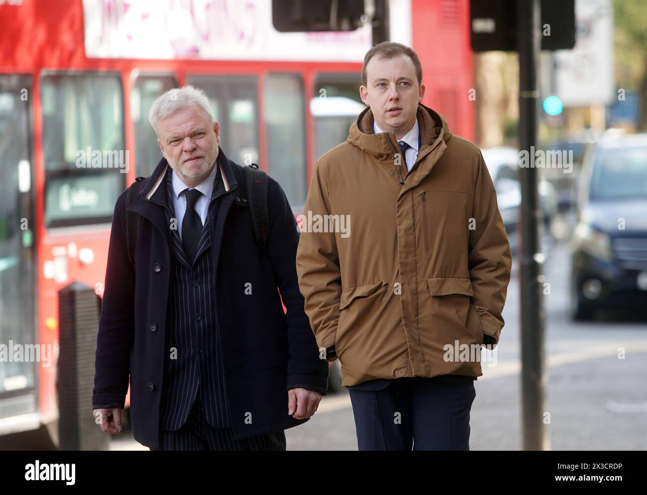 Christopher Berry (right) arrives at Westminster Magistrates' Court ...
