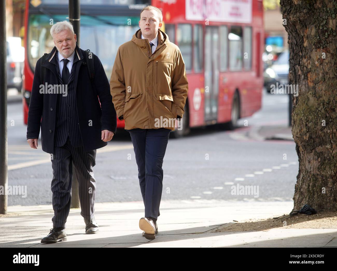 Christopher Berry (right) arrives at Westminster Magistrates' Court ...