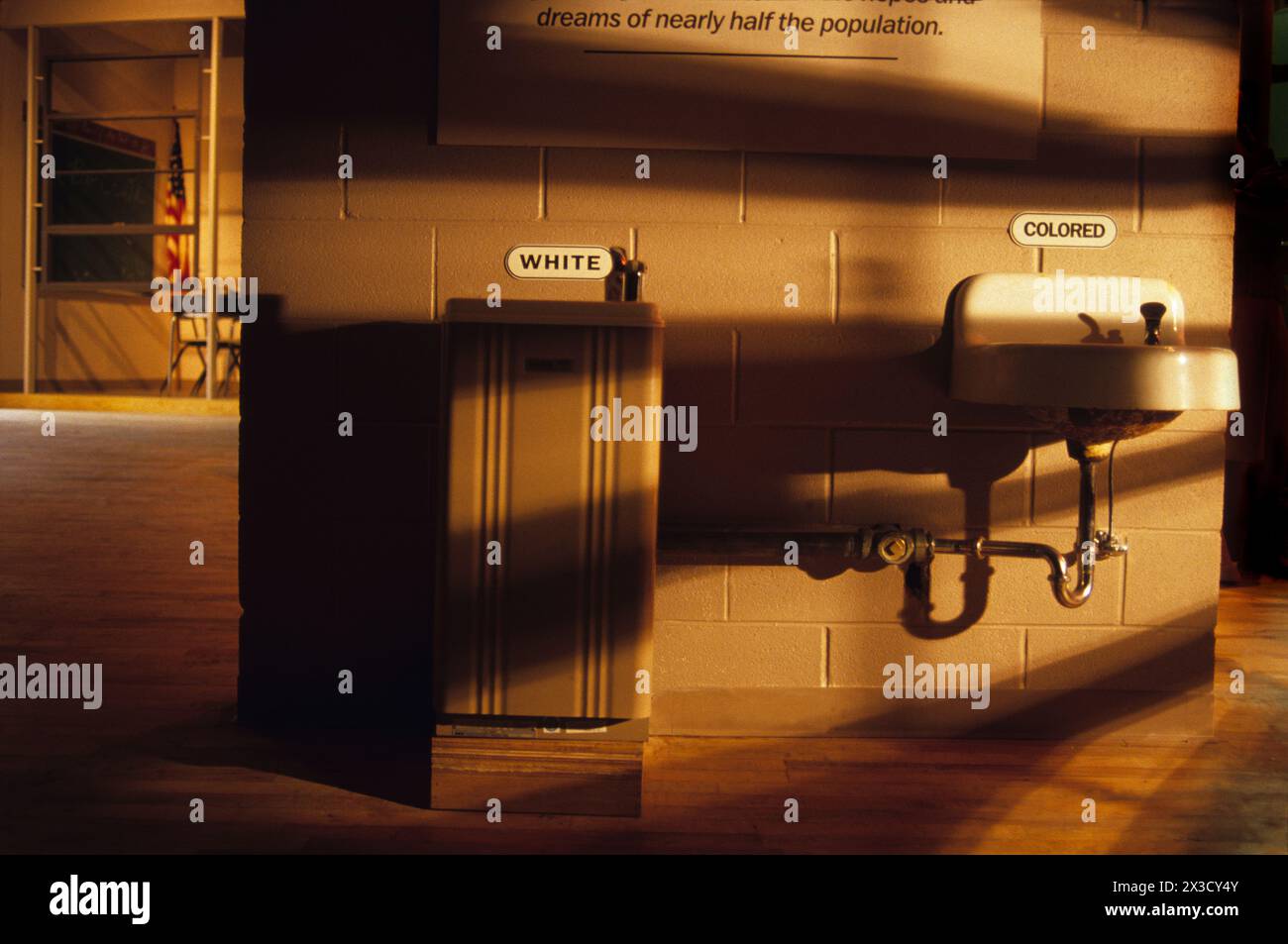 Water fountain discrimination in museum Stock Photo - Alamy