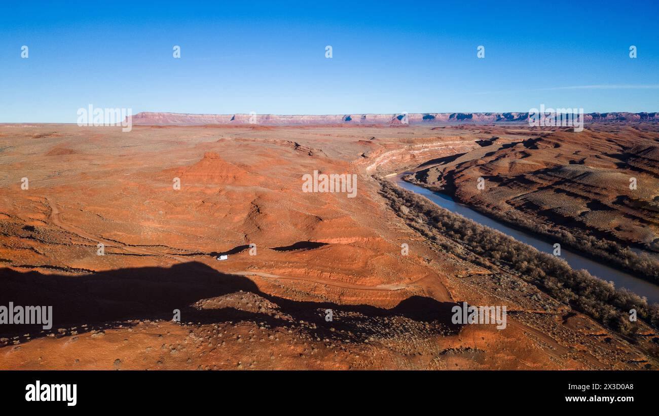 Van boondocking by San Juan River, Utah's red rock desert Stock Photo ...