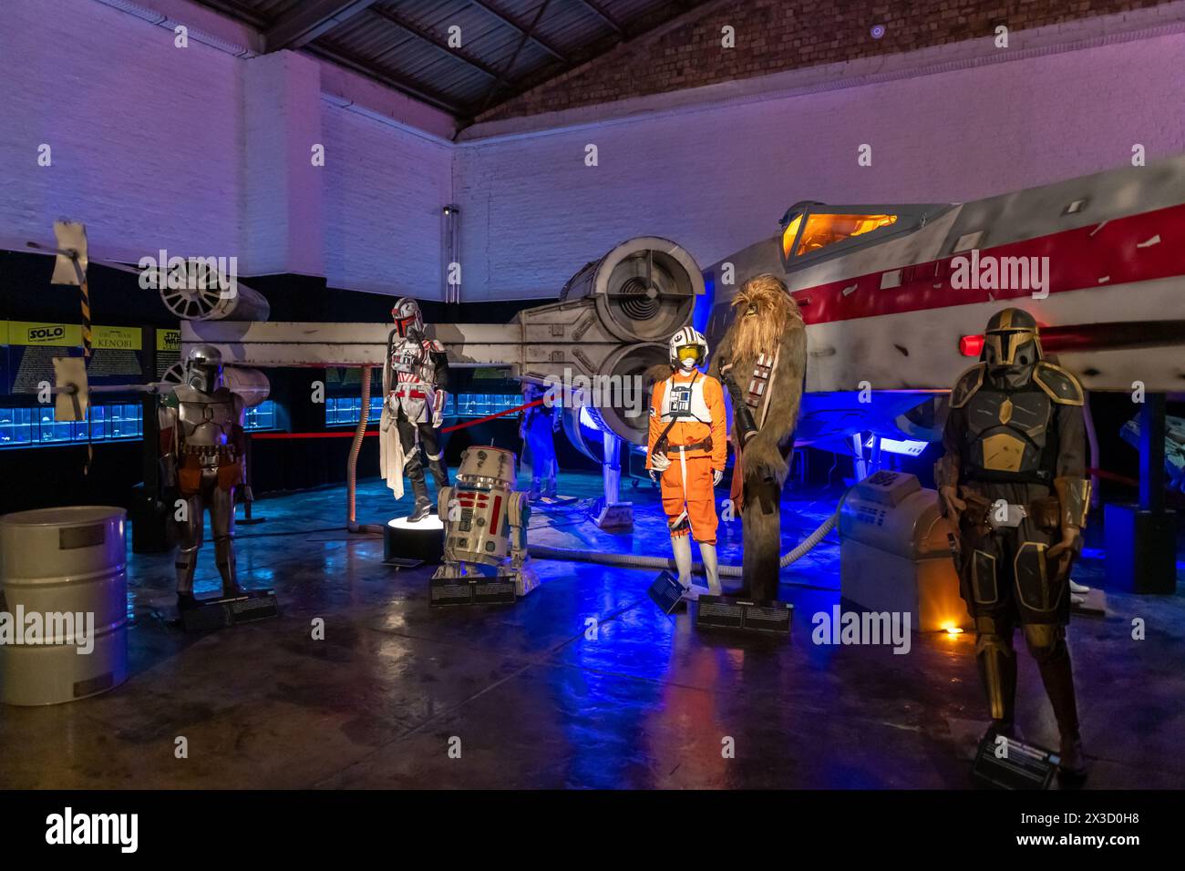 Berlin, Deutschland. 25th Apr, 2024. X-Wing, R2D2, Exhibits, Fans in costumes of the film SAGA ...