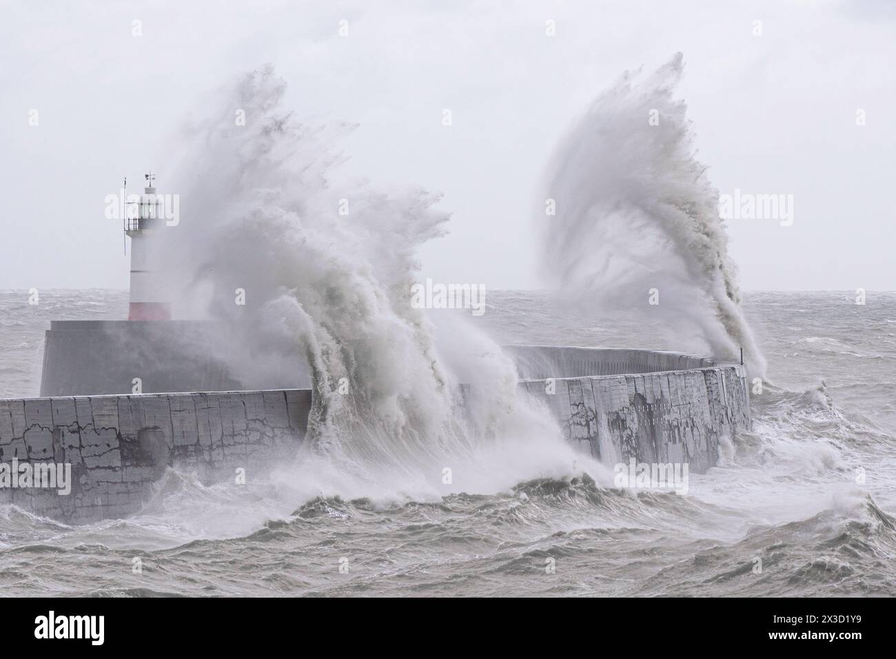 A ferocious spring storm, batters the harbour wall at Newhaven on the ...