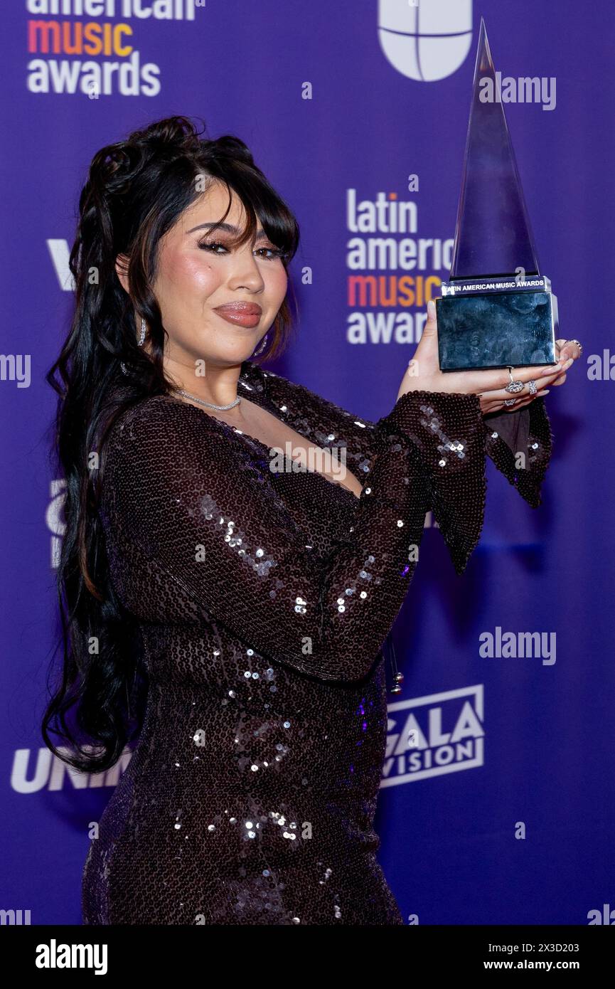 Las Vegas, USA. 25th Apr, 2024. Kali Uchis shows off her award at the ...