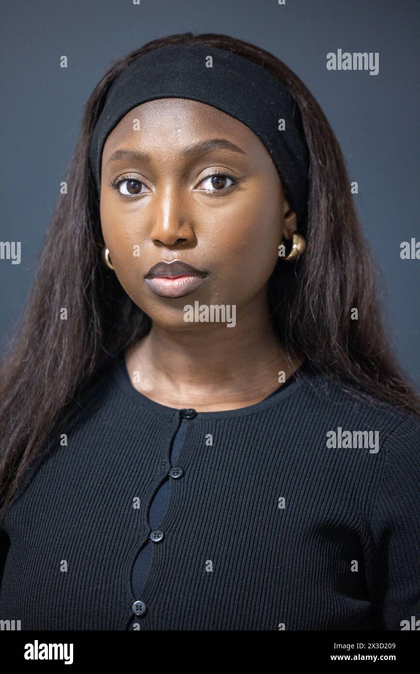 Confident young woman captures hi-res stock photography and images - Alamy