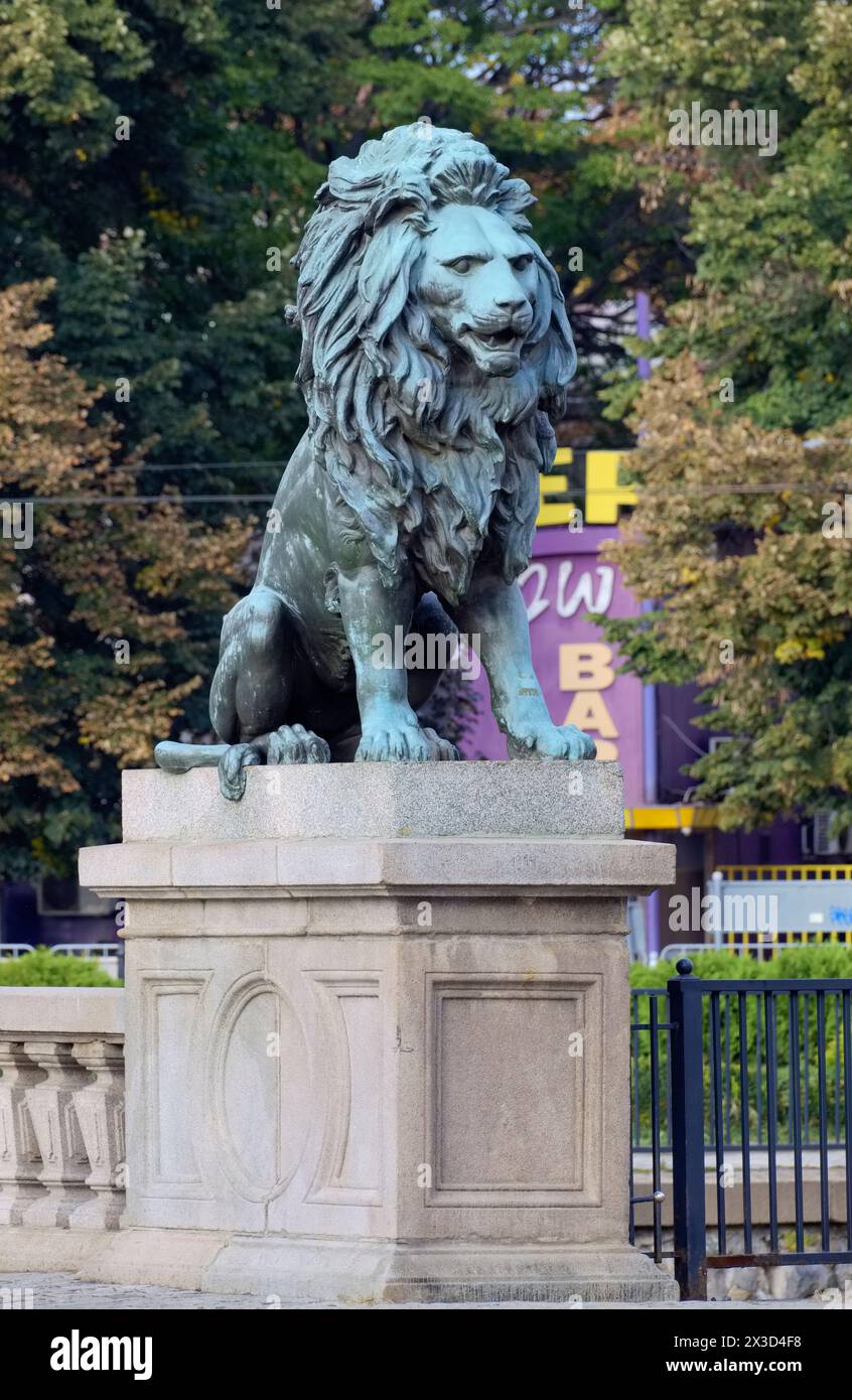 Bulgaria, Sofia; one of the bronze lions statues on the Lions Bridge ...