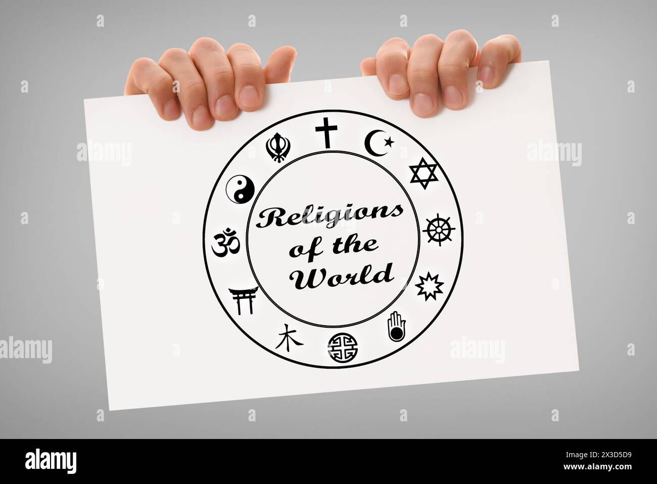 Hands holding a white sign with message of world religions and cultural ...