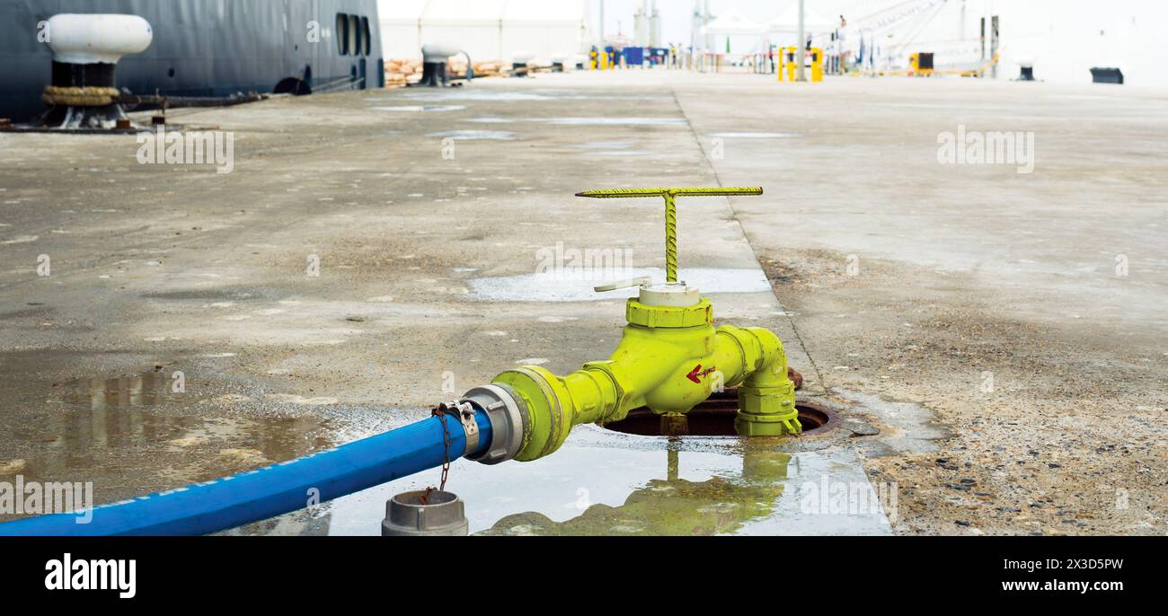 Water supply hose in port Stock Photo - Alamy