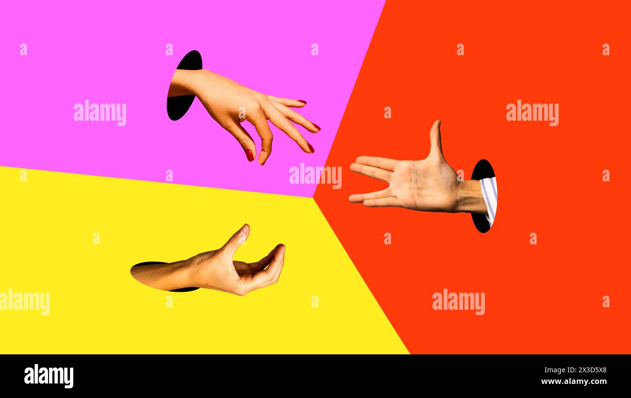 Human hands sticking out holes against multicolored background ...