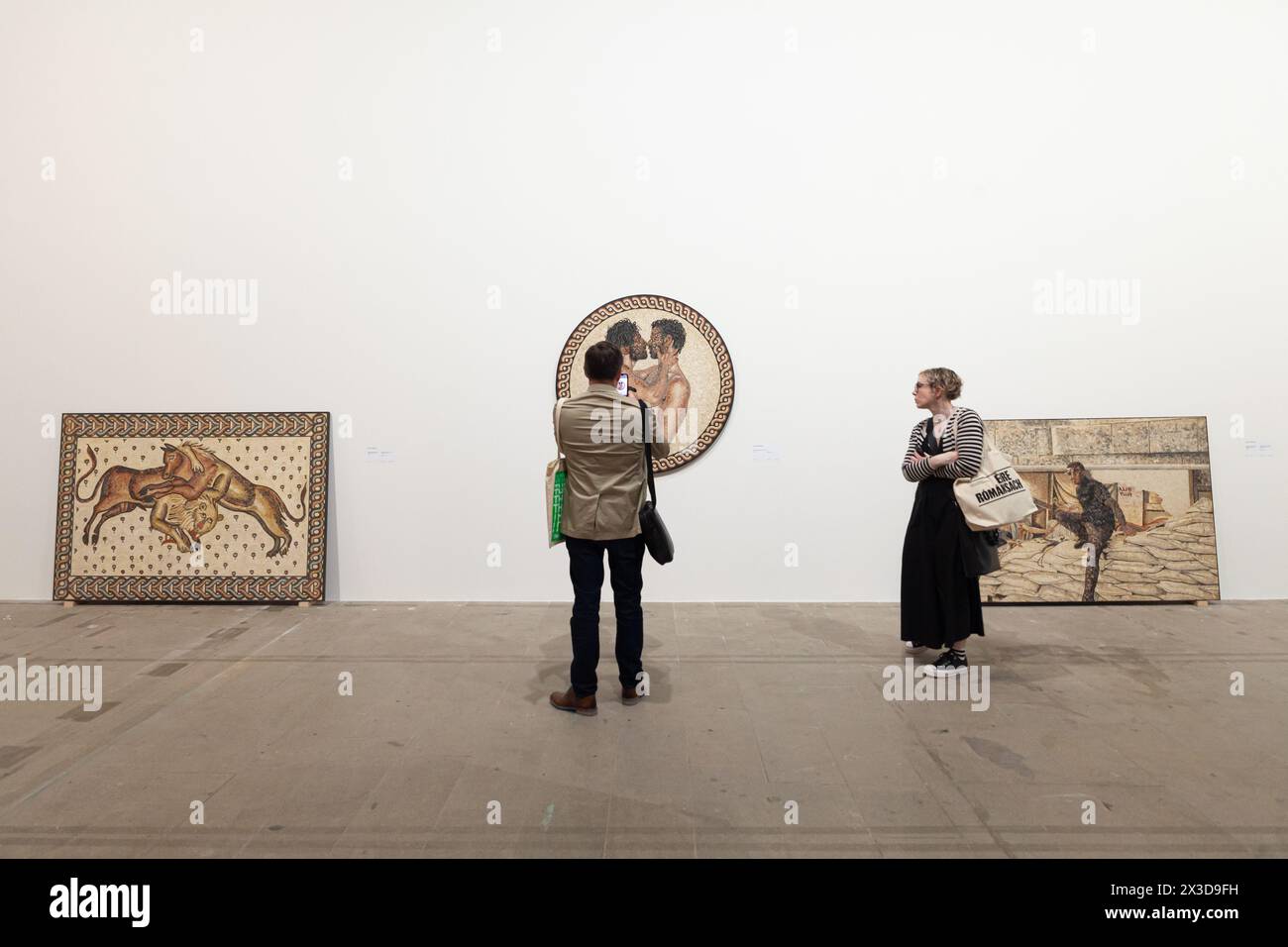 Venice, Italy - April 17, 2024: Artworks by Omar Mismar titled Roots in the sky exposed at the ...