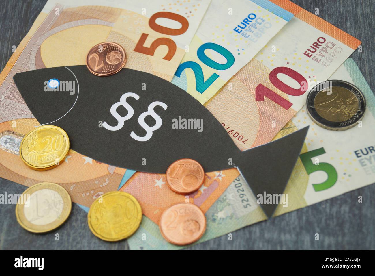 fish shape with paragraphs and money, symbol for fishing quota Stock ...