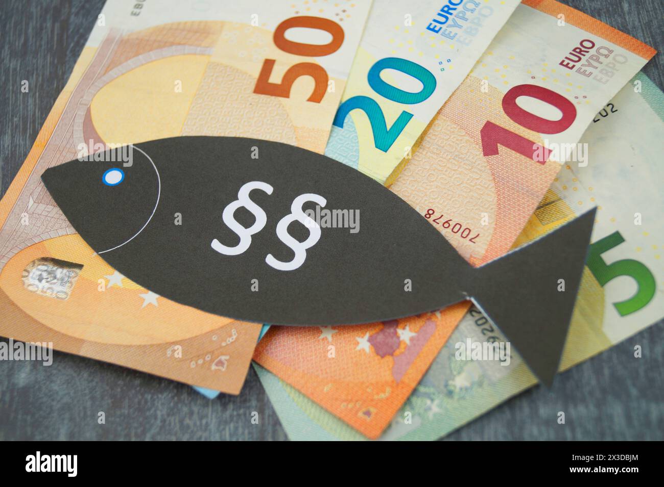 fish shape with paragraphs and money, symbol for fishing quota Stock ...