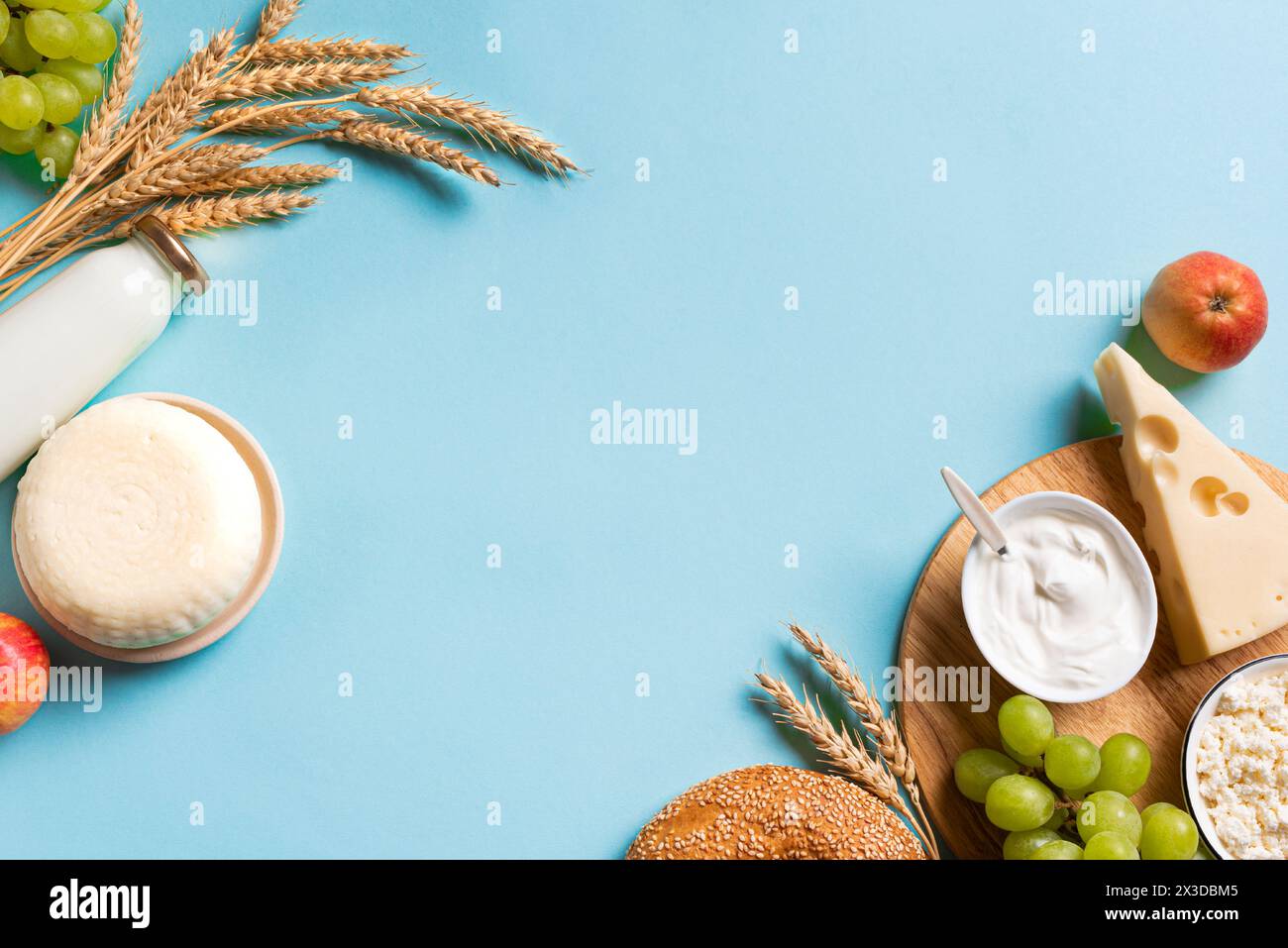 Religious Jewish holiday Shavuot concept with dairy products, cheese ...