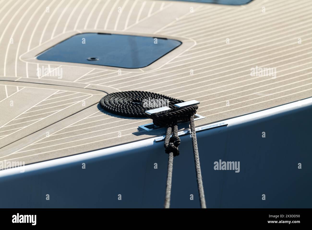 The bow of a beautiful powerboat with nice clean lines showing the deck ...