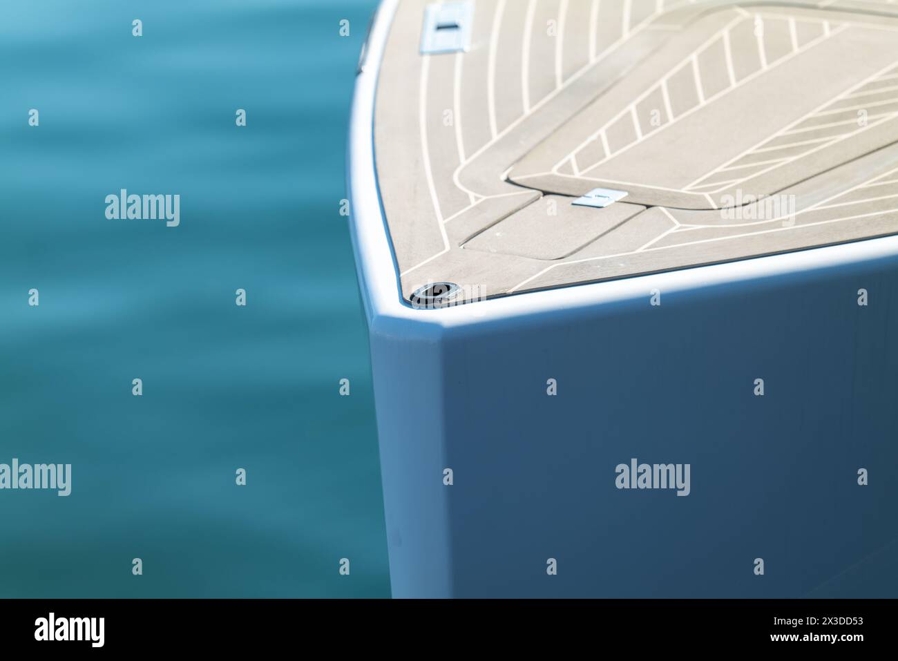 The bow of a beautiful powerboat with nice clean lines showing the deck ...