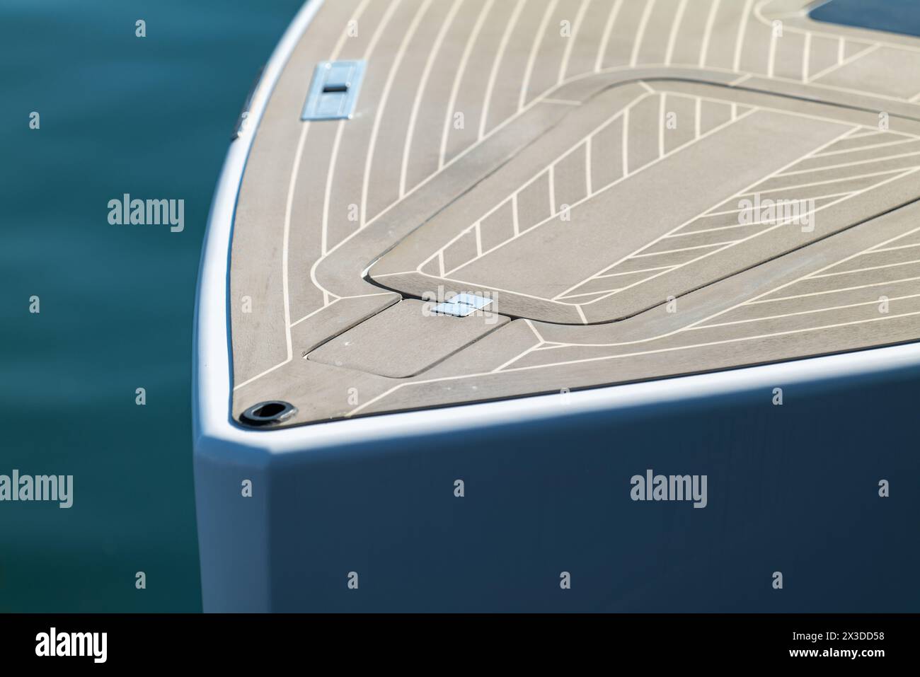 The bow of a beautiful powerboat with nice clean lines showing the deck ...