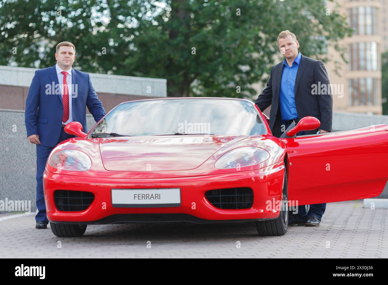 MOSCOW, RUSSIA - JUN 22, 2016: two mature business people (with model ...
