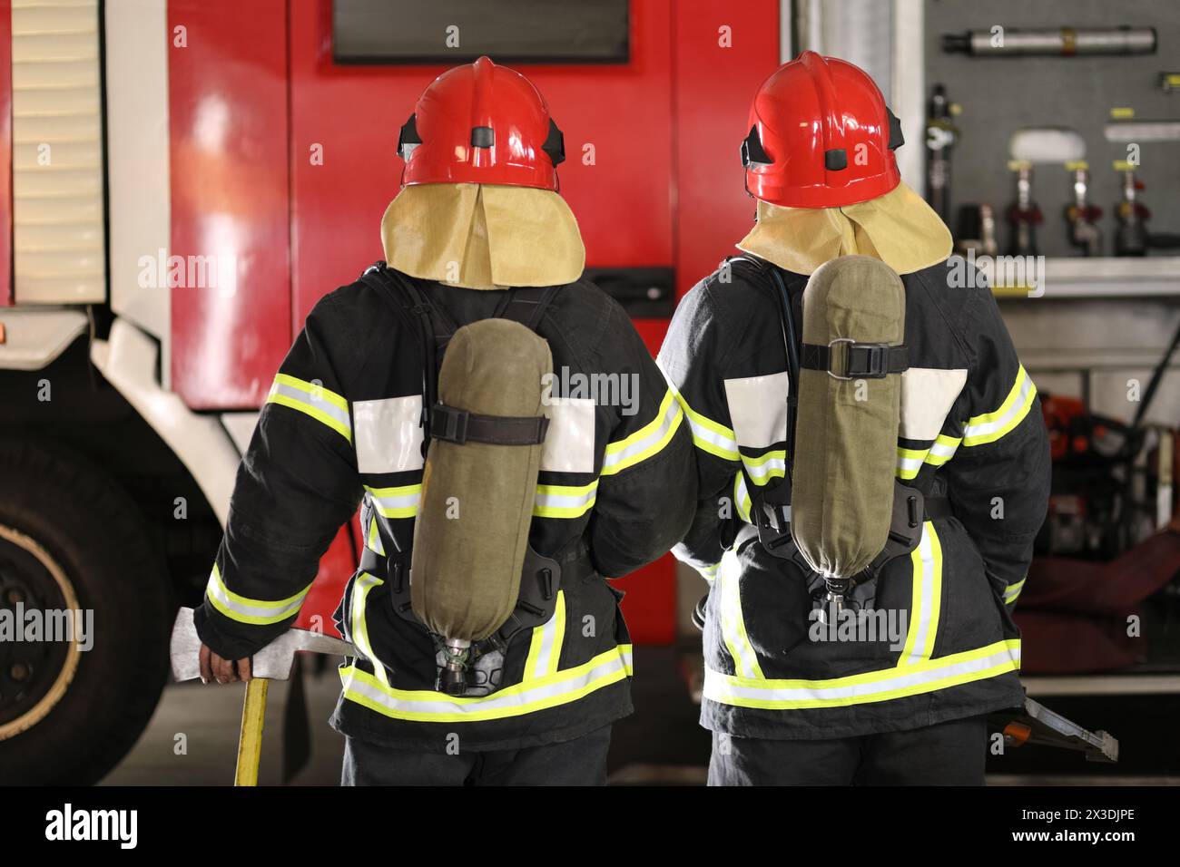 Fireman hose back view hi-res stock photography and images - Alamy