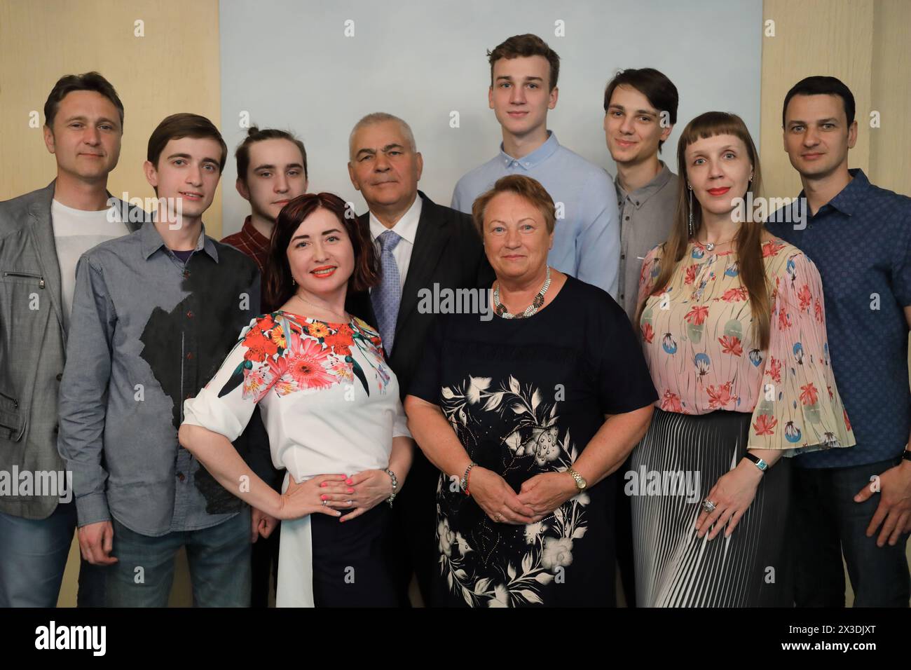 family photo of several generations (grandchildren, children, parents ...