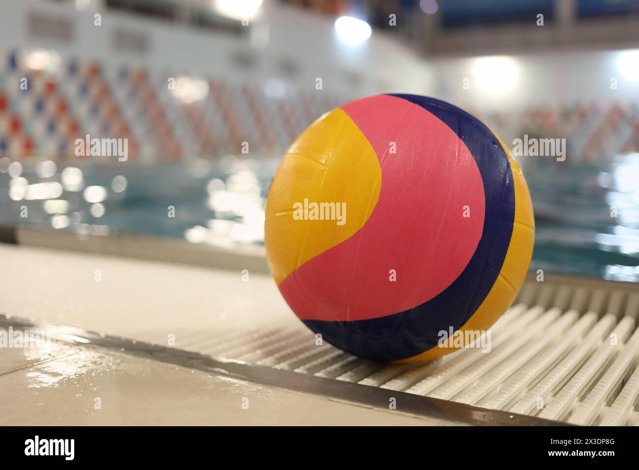 Bright yellow water polo ball hi-res stock photography and images - Alamy