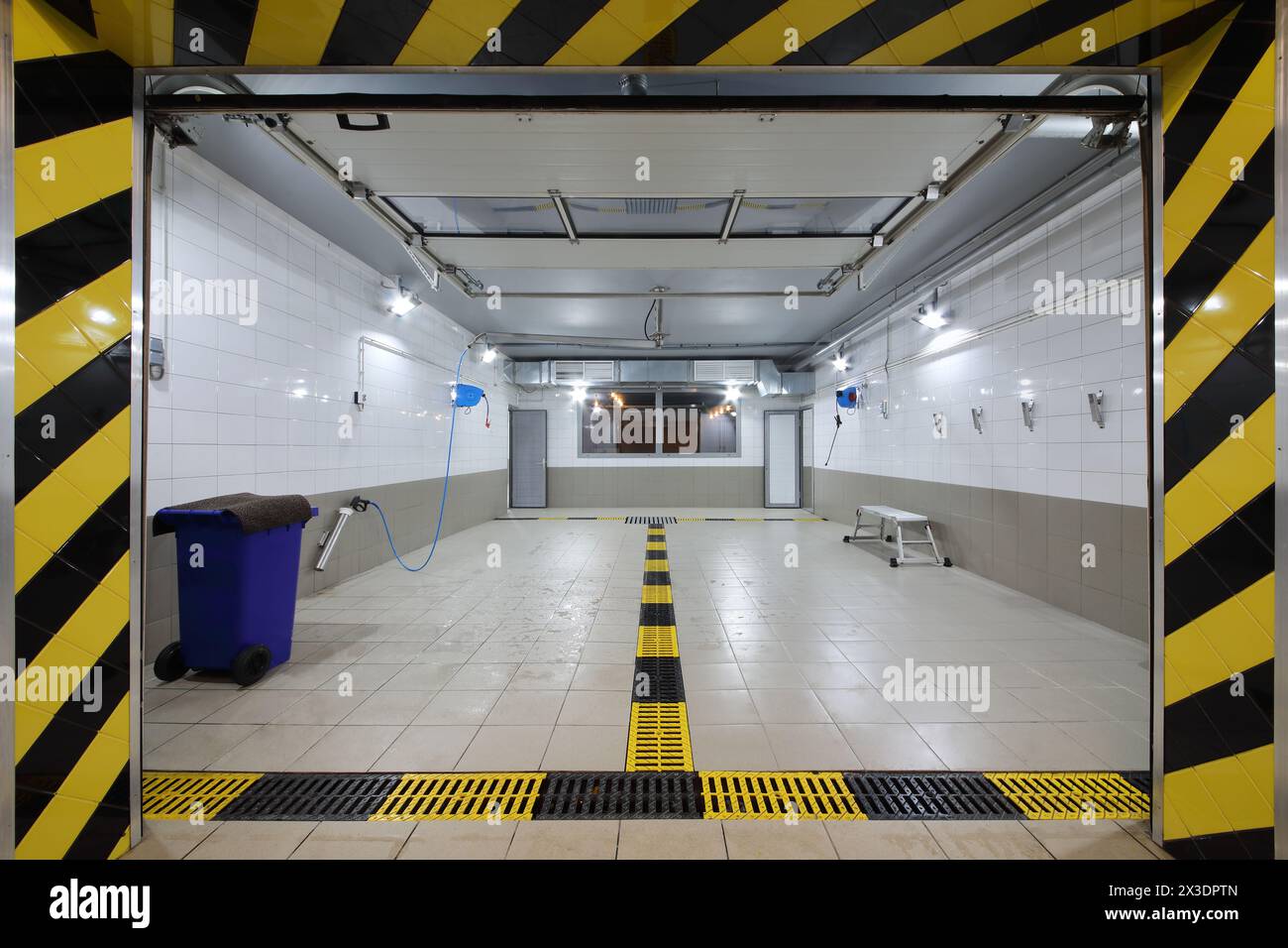 Empty clean car wash room with drainage device and high-pressure ...