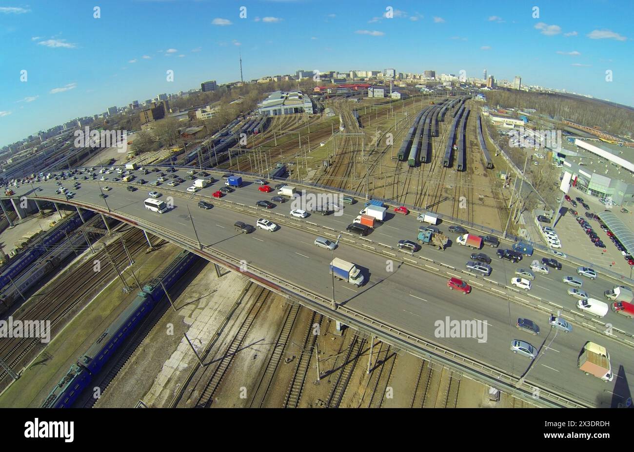 Urban landscape with many railroad tracks and overpass, aerial view ...