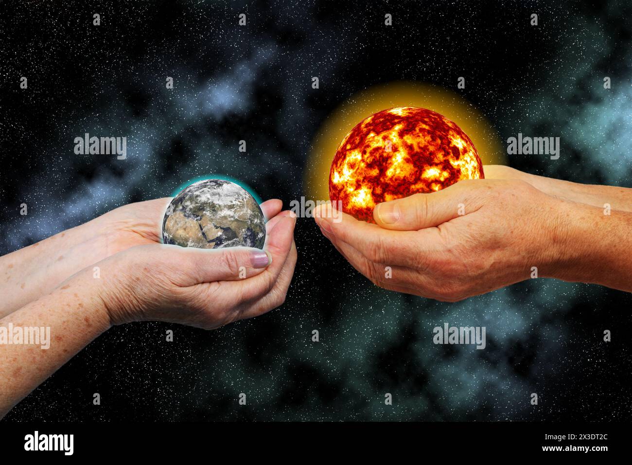 Elderly hands of man and woman holding the sun and earth against the ...