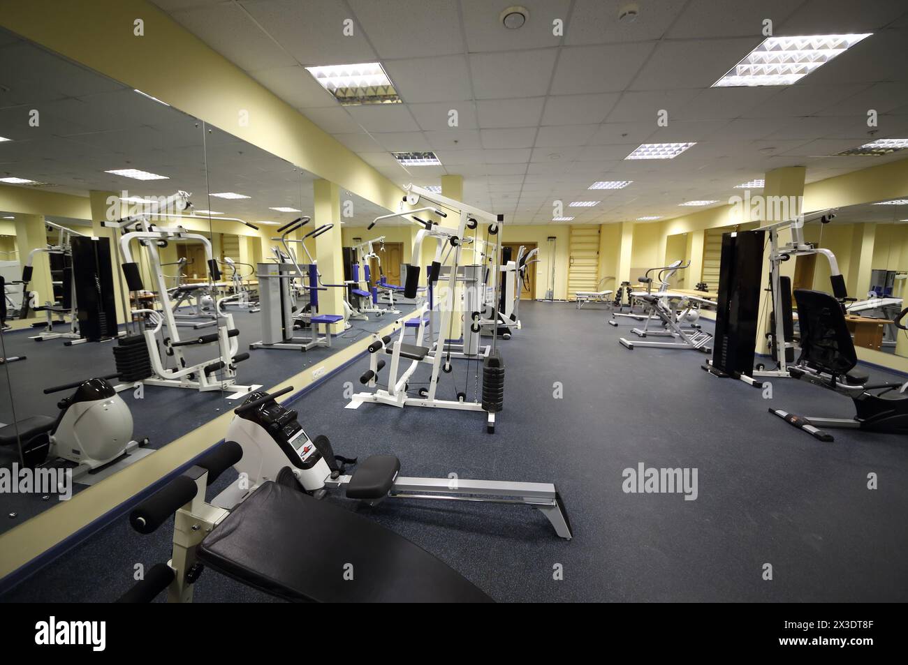RUSSIA, MOSCOW - 10 DEC, 2014: Light big gym with many equipment for ...