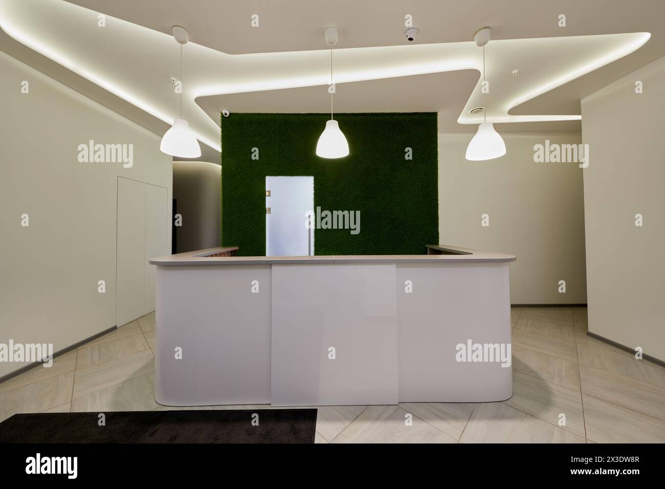 Interior of modern reception hall with front desk Stock Photo - Alamy