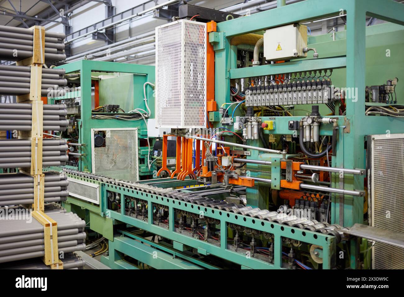 Automated production line at plastic pipes factory Stock Photo - Alamy