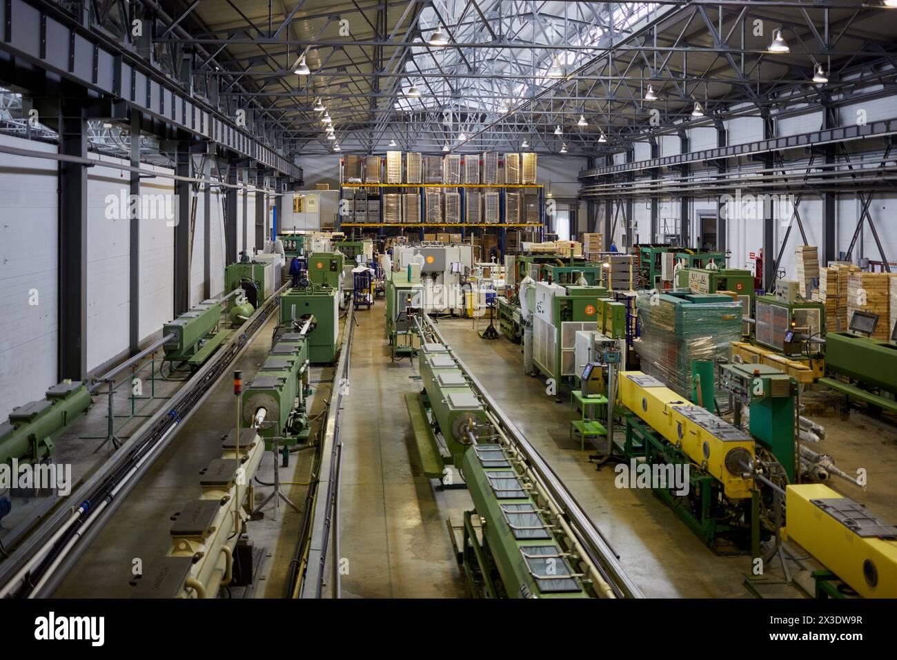 MOSCOW, RUSSIA - MAR 01, 2017: Large workshop producing plastic pipes ...