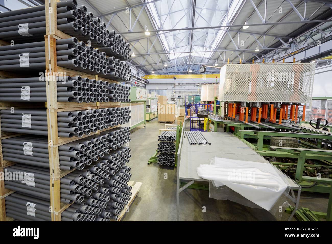 MOSCOW, RUSSIA - MAR 01, 2017: Plastic pipes in packages and machine ...