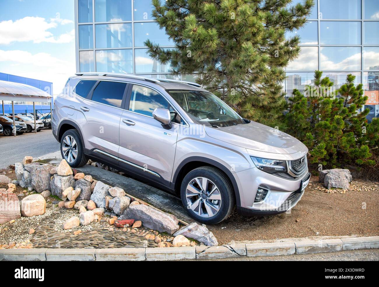 Samara, Russia - April 16, 2024: New Geely Okavango vehicle next the ...