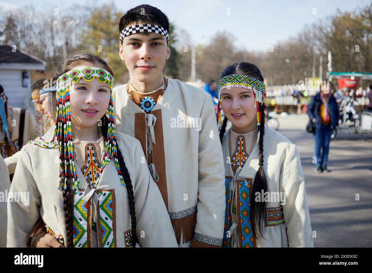 Three yakuts people in national folk clothes at park Stock Photo - Alamy