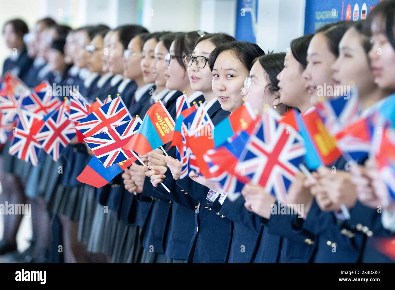 Foreign Secretary Lord David Cameron is greeted by pupils at School No.23 in Ulaanbaatar ...