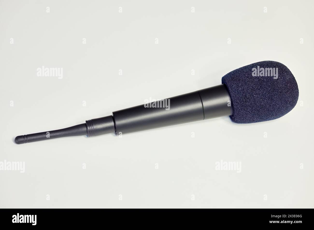 Black radio microphone with wind noise reducer Stock Photo - Alamy