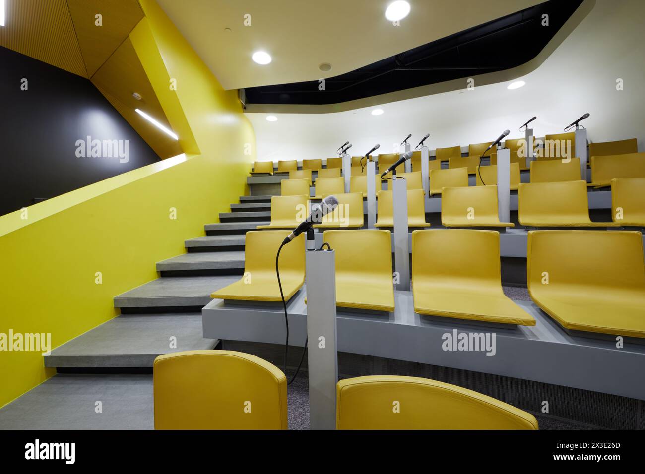 Conference hall with microphones hi-res stock photography and images ...