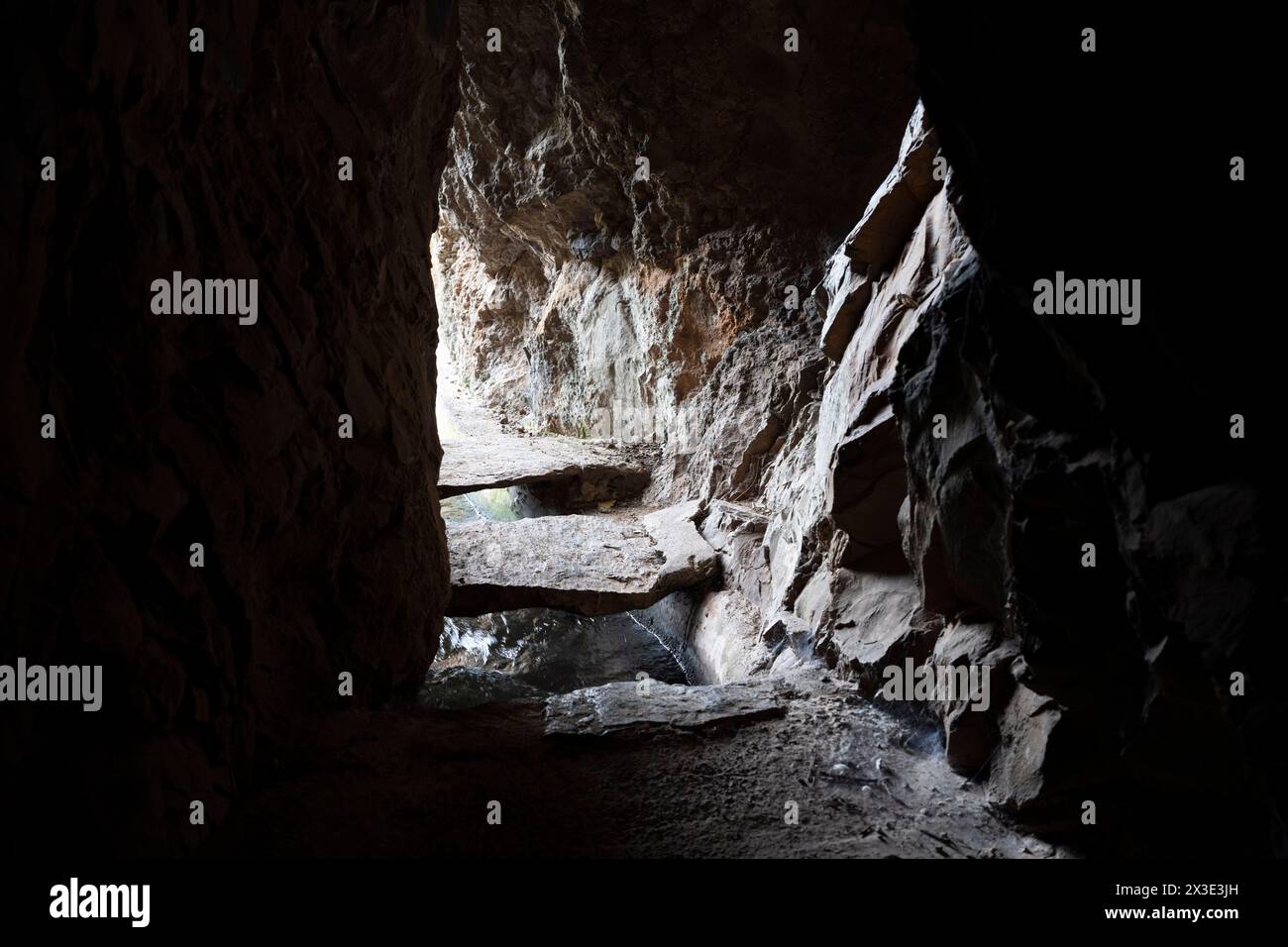 The 'Levada dos Pionais' makes its way through low, short caves in the ...