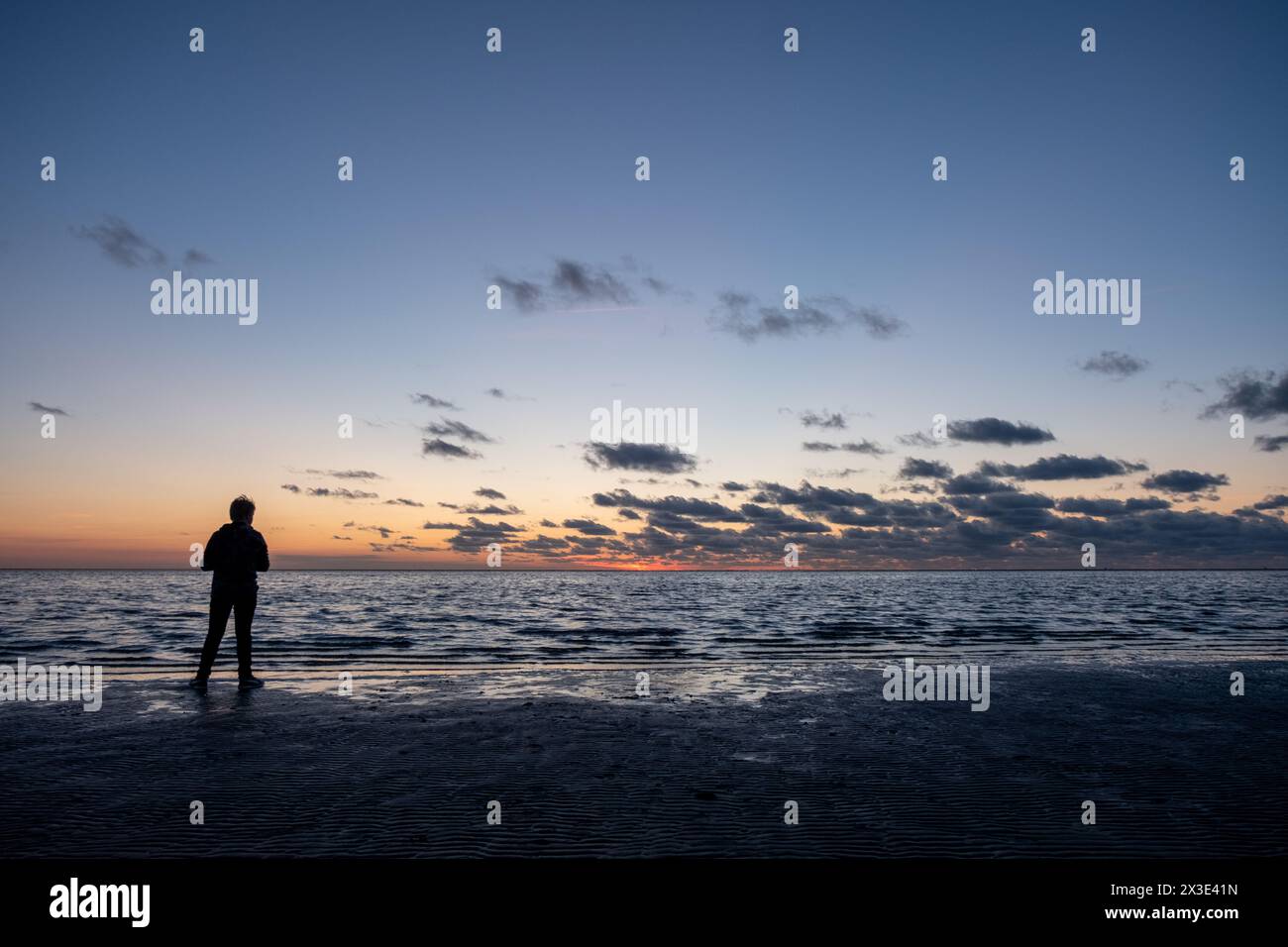 Thoughtful figure stands hi-res stock photography and images - Alamy