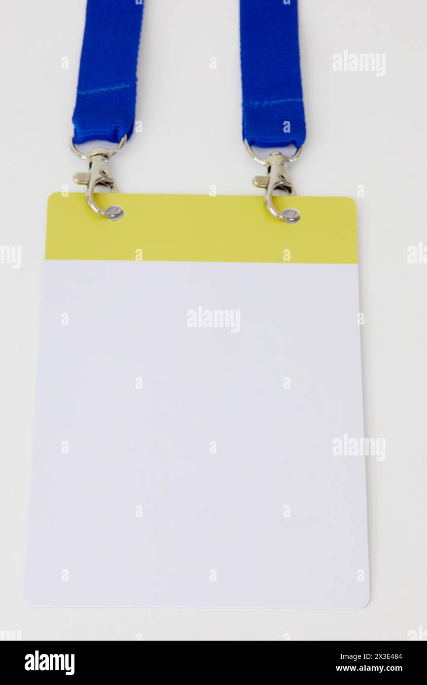 Empty ID card on blue belt on white background Stock Photo - Alamy