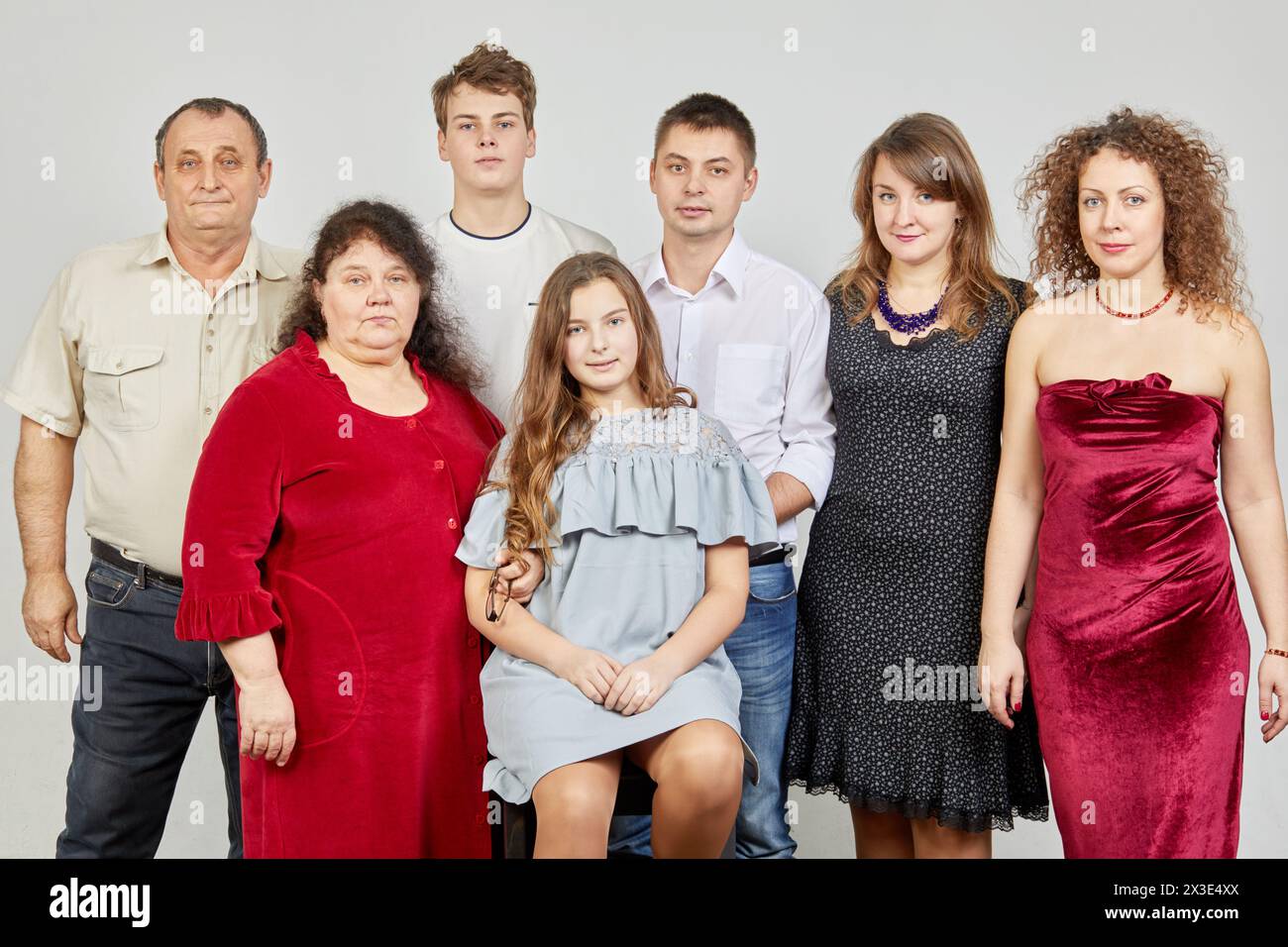 Group portrait of family of seven members in studio Stock Photo - Alamy