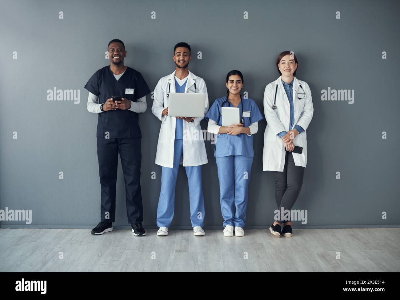 Technology, doctors and portrait of team by wall for interview or ...