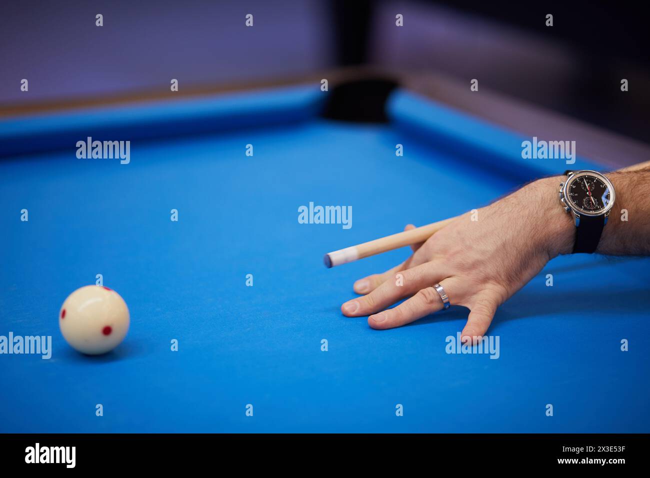 Male hand aiming ball with cue stick on pool table Stock Photo - Alamy