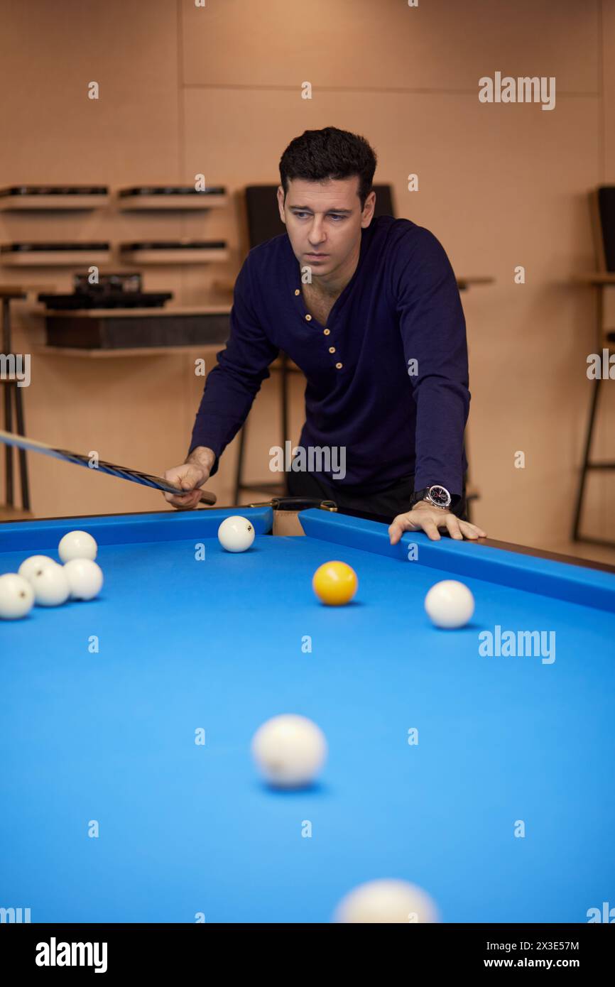 Blue pool table person hi-res stock photography and images - Alamy