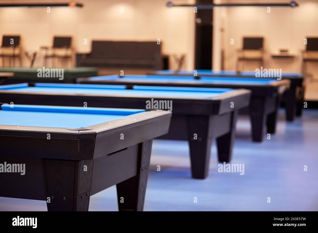 Interior of billiard club, tables and chairs Stock Photo - Alamy